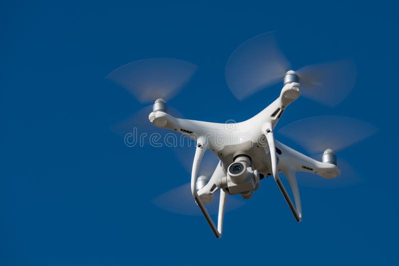 Drone Quad Copter with High Resolution Digital Camera on the Sky Stock ...