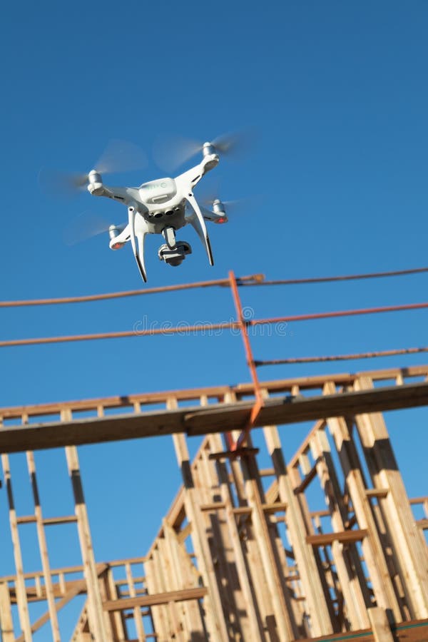 Drone Quadcopter Flying and Inspecting Wood Framing at Construction ...