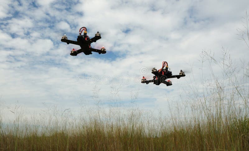 Drone Racing Over the Green Field Stock Photo - Image of remote, hobby ...