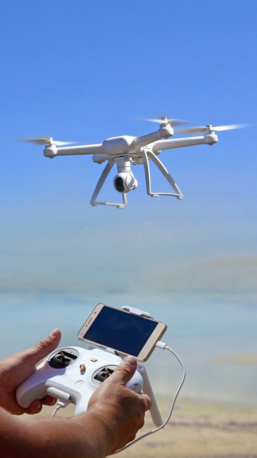 Drone Remote Controller in Man Hands and Drone Stock Image - Image of ...