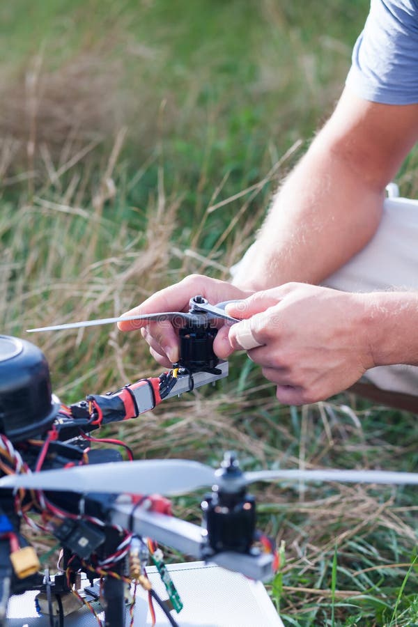 Drone Repairing on the Field Stock Photo - Image of motors, flying ...