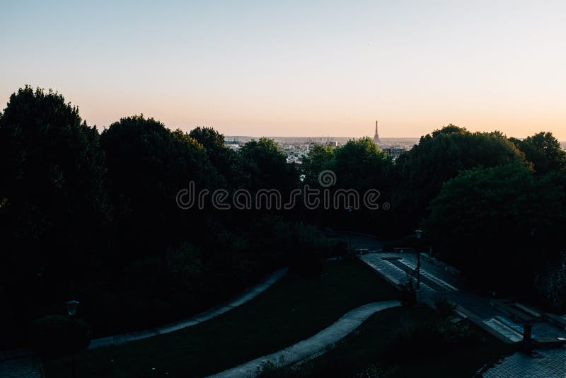 Drone Shot of Asphalt Walk Paths in a Park in Paris in the Evening ...