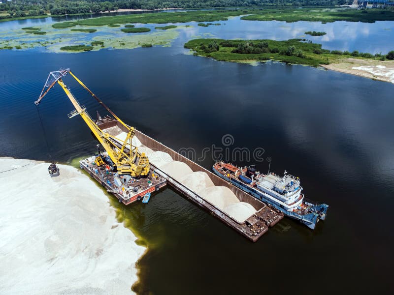 Aerial View of the Loading of Dry Cargo Ship with Crushed Stone. Stock ...
