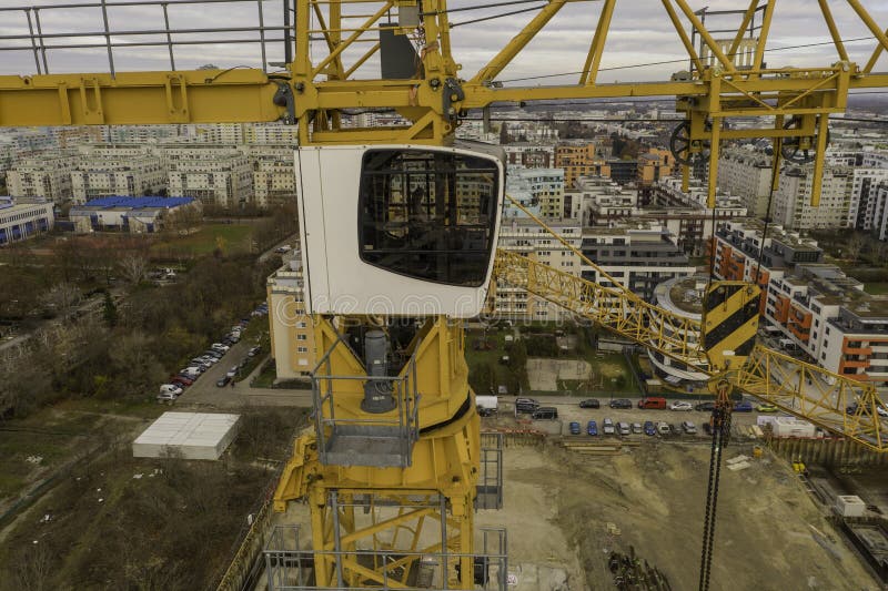 Drone Shot of a Crane Working on a Construction Site Stock Image ...