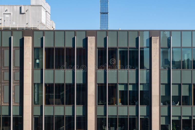 Drone Shot of Glass Windows of a Modern and Well-designed Building ...