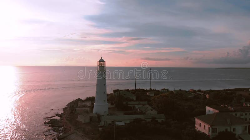 Drone Shot Lighthouse Beach Lighthouse Sunset. Lighthouse on a ...