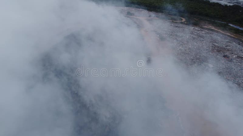 Drone Shot White Smoke Release from Fire Happen at Garbage Dump Stock ...