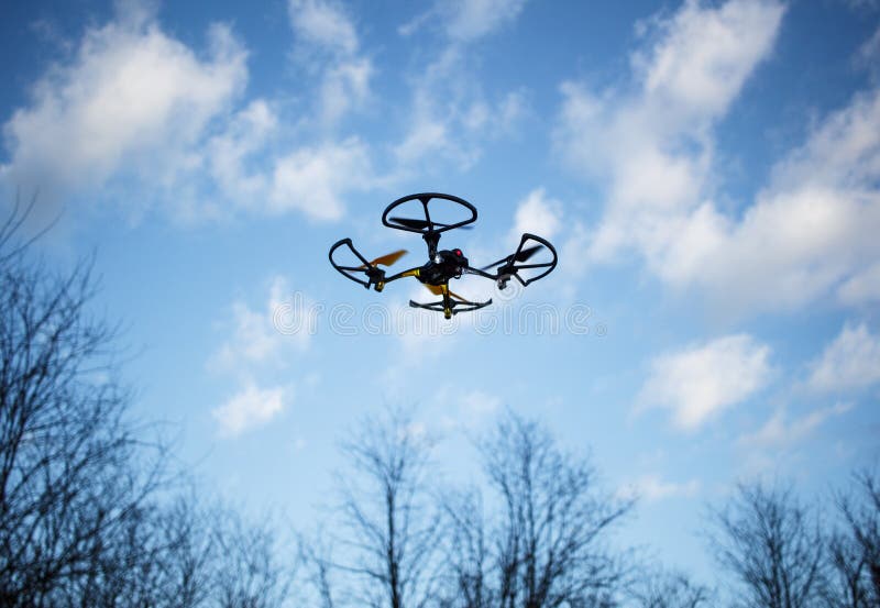 Drone in the sky stock image. Image of quadcopter, aerial - 106893967