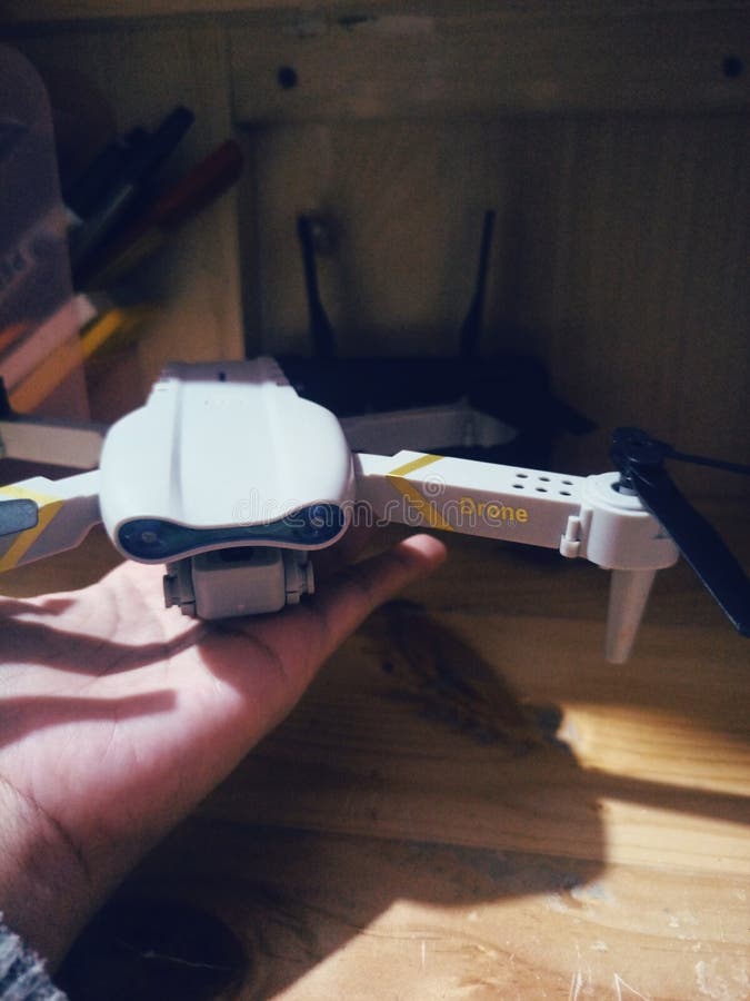 Drone sloping in hand stock image. Image of machine - 267212585