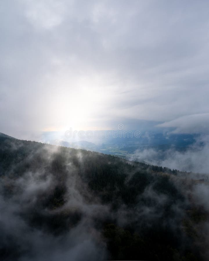Drone Vertical Shot of Fog Over Mountains with Sunrays Stock Image ...