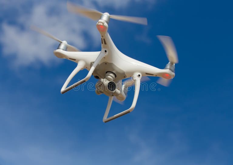Drone with a Video Camera Flies in the Sky Stock Photo - Image of drone ...