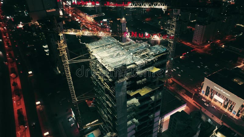 Drone Cinematic Video of Skyscrapers Being Built at Night on the ...