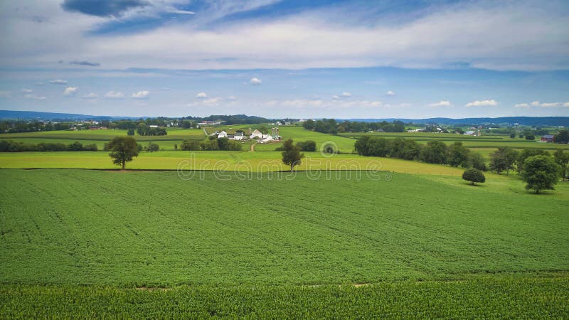 Drone View of Amish Countryside with Barns and Silos, a Patch Work of ...