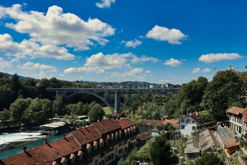 Drone View of Bern with Red-tiled Buildings by a River with Trees and a ...
