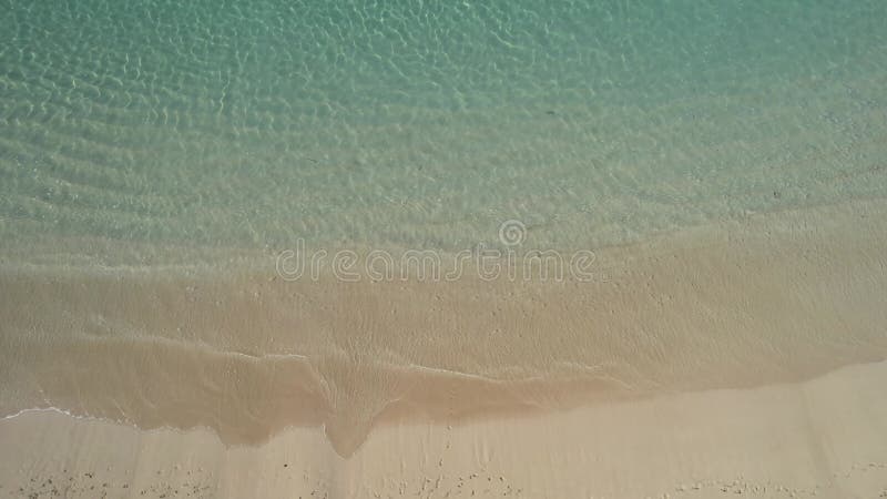 Drone View of Empty Lagoon Beach with Undulating Waves Stock Footage ...