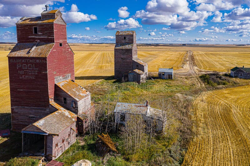 Drone View of the Lepine Grain Elevators before the Yellow Fields Under ... Drone View of the Lepine Grain Elevators before the Yellow Fields Under ...