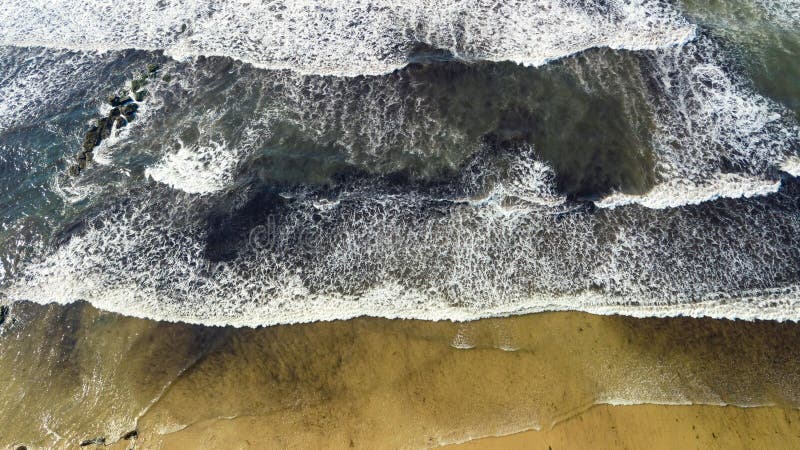 Drone View of the Ocean Waves Washing the Sandy Beach Stock Photo ...