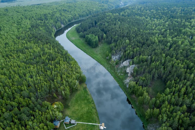 Drone View of the River among the Forest, Rocky Banks and Turns, Many ...