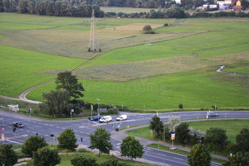 A Drone View of a Road Intersection Near Fields with Greenery Stock ...