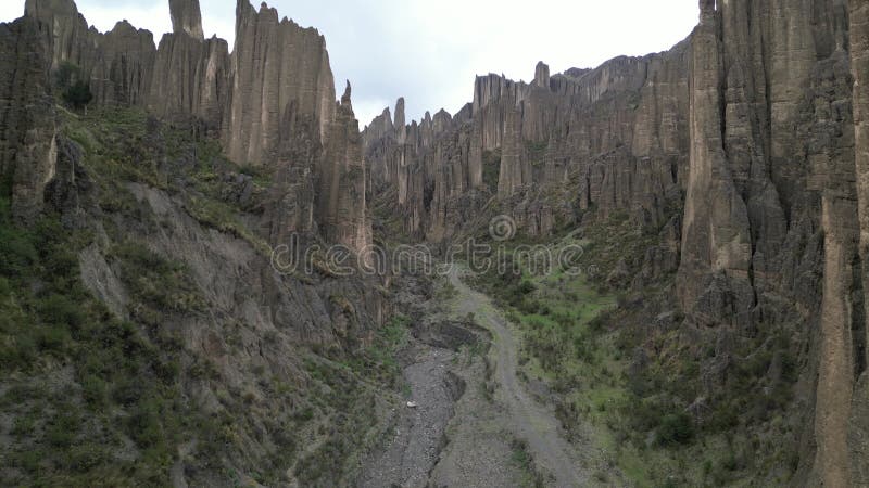 Rugged Path through Dramatic Canyon with Some Greenery and Moss in the ...