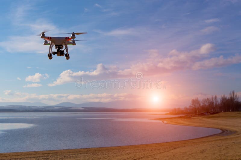 Drone watching the sunset stock photo. Image of blue - 49776292