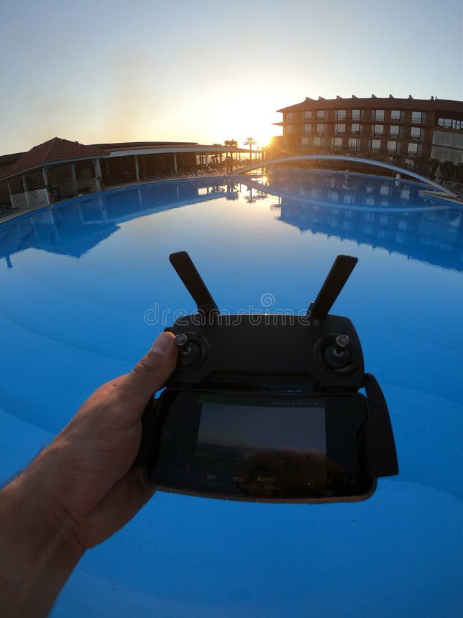 Drone Remote by the Pool at Sunset in the Hotel Stock Image - Image of ...