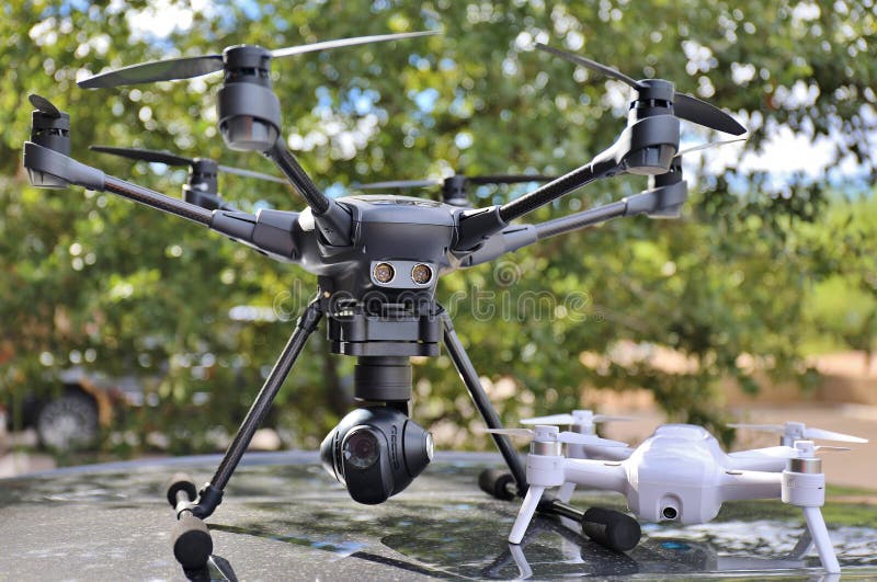 DRONES - Large & Small Camera UAV / UAS Stock Photo - Image of backlit ...