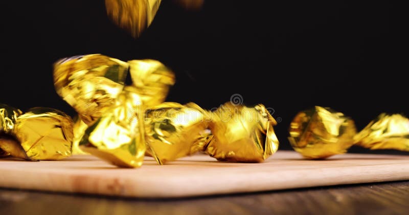 Drop a Chocolate Candy on the Board Stock Footage - Video of candies ...