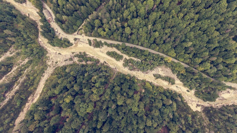 Drop Down View of River Bed Running through a Forest. Stock Image ...