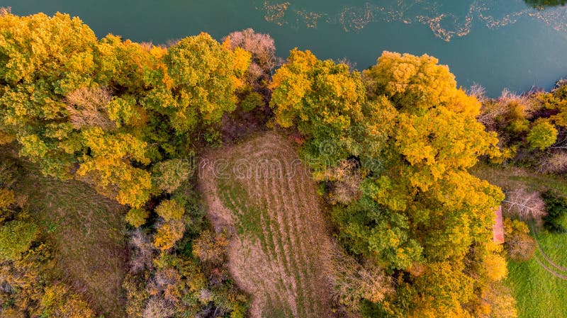 Drop Down View of River Flowing through Fields after Harvest. Stock ...