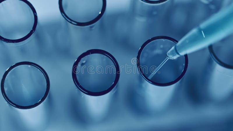 Drop Dripping into Laboratory Test Tubes. Stock Footage - Video of ...