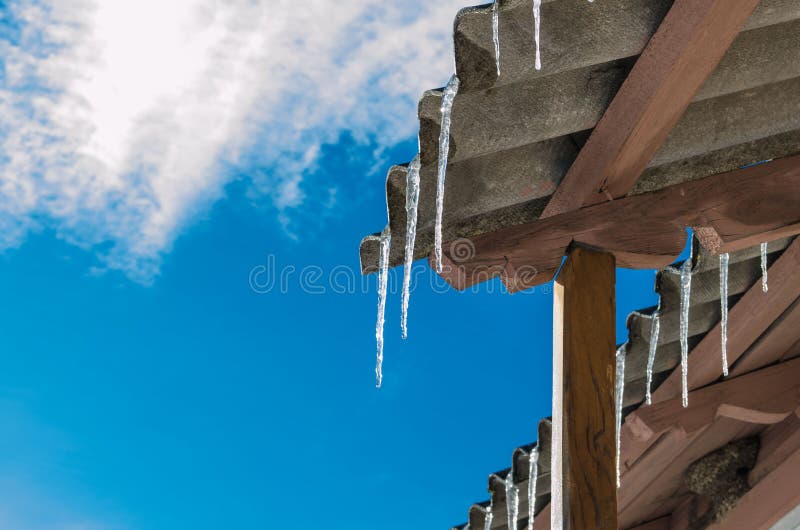 Drop Falling from Roof To Water on Ice Stock Photo - Image of hanging ...