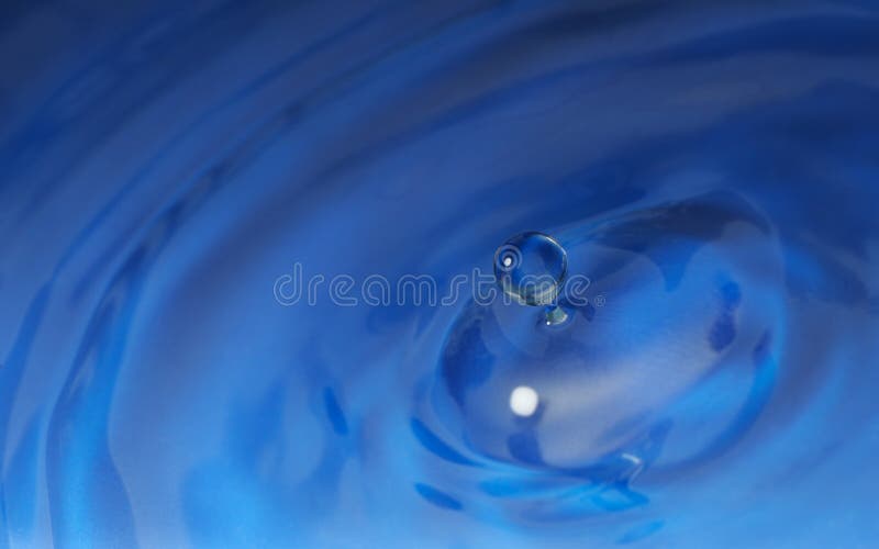 Drop falling in water stock photo. Image of blue, fall - 23397462