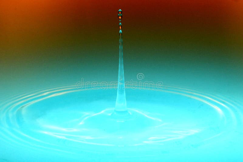 A Drop Falls into the Water, Forming a Column with a Row of Pearls ...