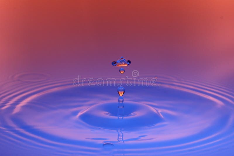 A Drop Falls into the Water and Forms a Figure of Pearls Stock Image ...
