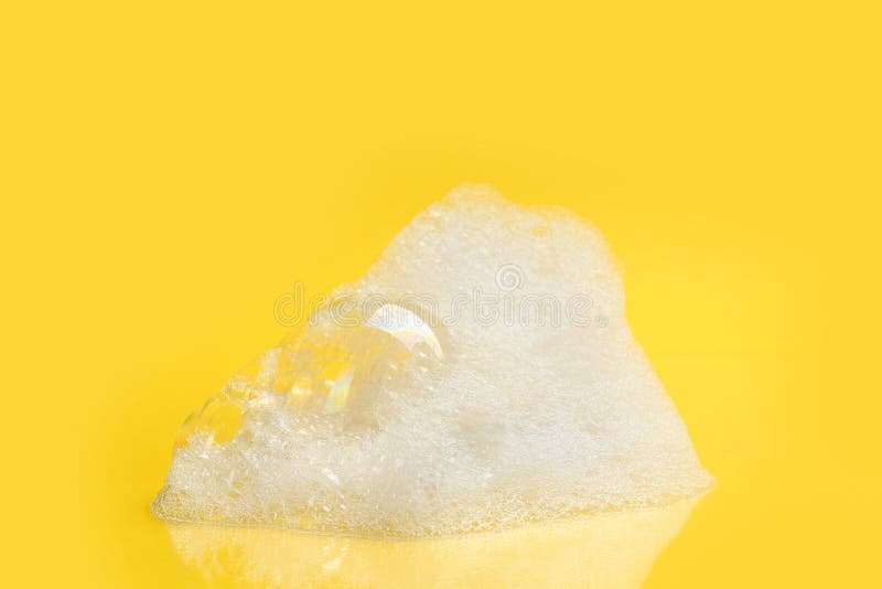 Drop of Fluffy Bath Foam on Yellow Background Stock Image - Image of ...