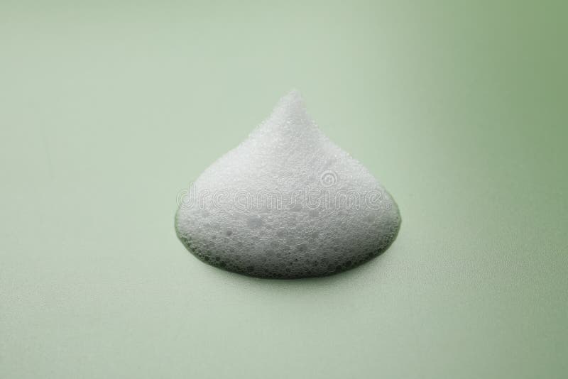 Drop of Fluffy Soap Foam on Green Background Stock Photo - Image of ...