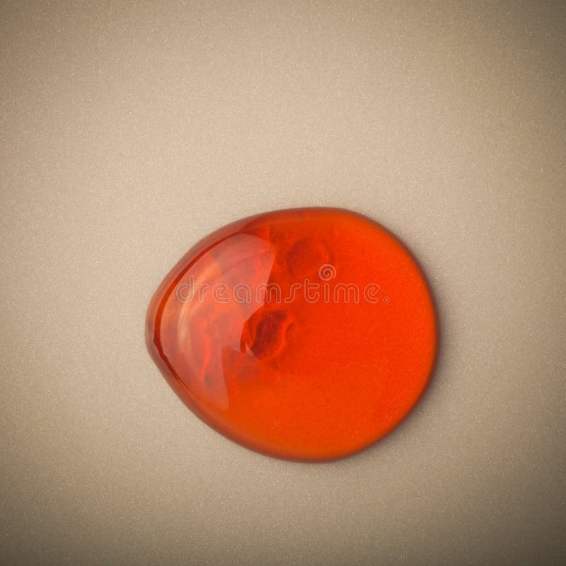Drop of Food Coloring on a Light Background. Toned Stock Image - Image ...