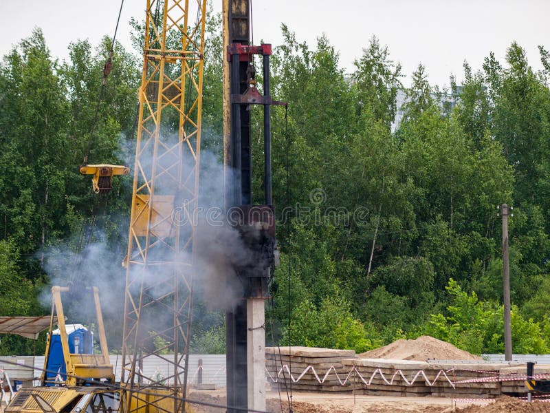 Drop Hammer while Working on Driving Piles, Diesel Hammer Strikes a ...