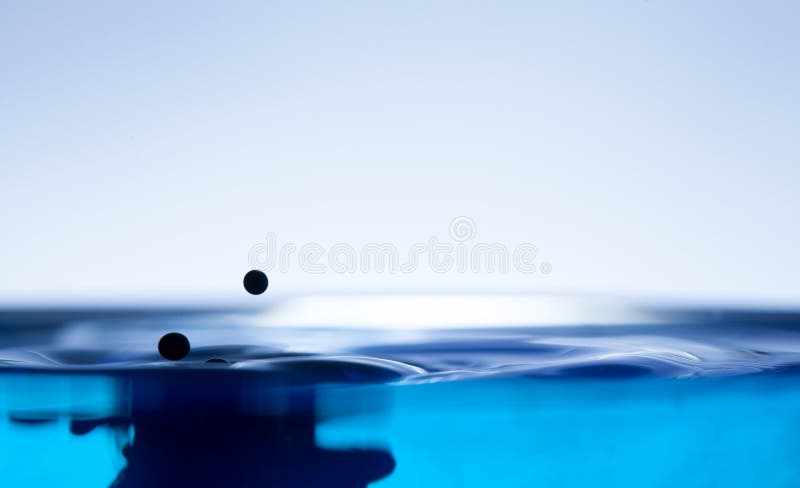 Drop of ink falling stock photo. Image of droplet, paint - 93726424