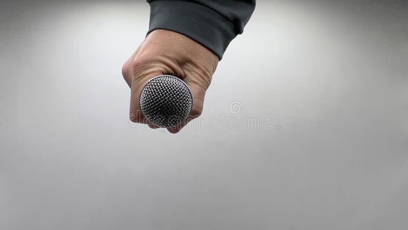 Drop the Mic on Sequence - Male Hand Black Mic Stock Image - Image of ...