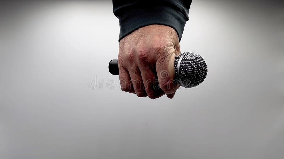 Drop the Mic on Sequence - Male Hand Black Mic Stock Photo - Image of ...