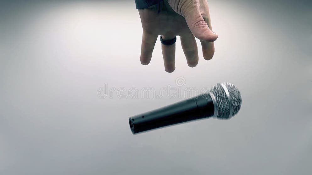 Drop the Mic on Sequence - Male Hand Black Mic Stock Photo - Image of ...