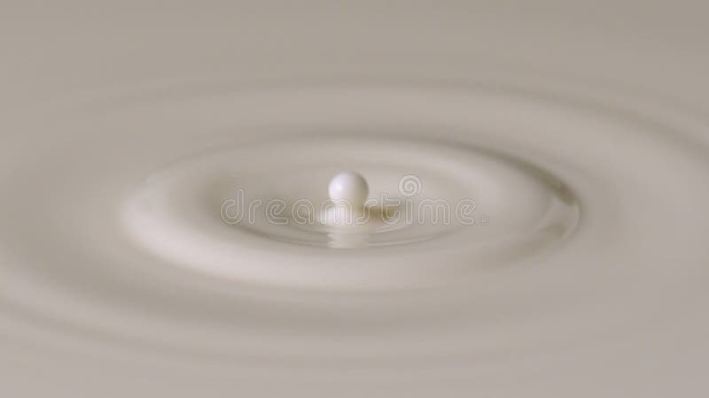 Drop of Milk Falling into a Glass, Slow Motion. Stock Video - Video of ...