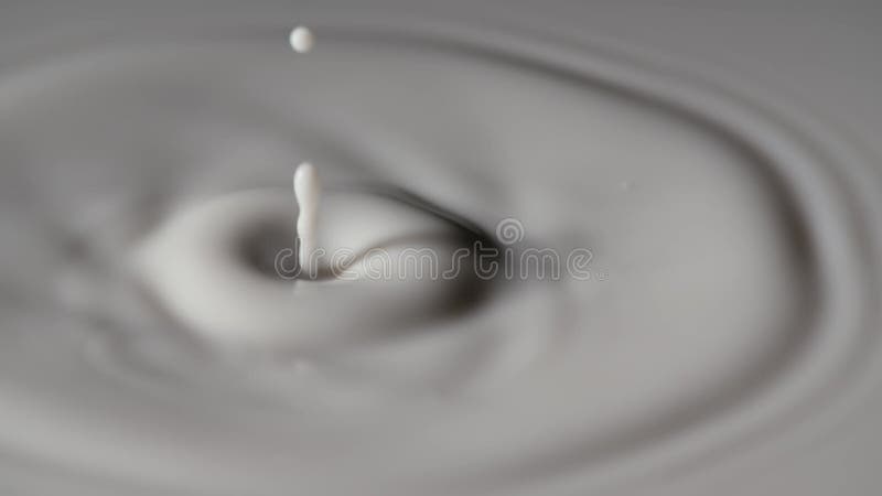 Milk Droplet Making Splash Crown and Ripples in the Mug with Creamy ...