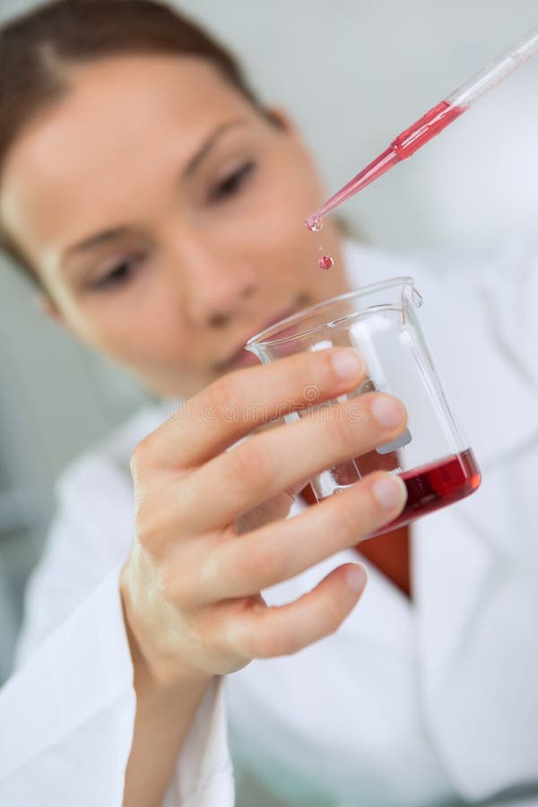 Drop of the mixture stock photo. Image of researcher - 119528494