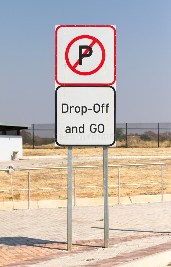 Drop-off and go area stock image. Image of sign, kiss - 128813803