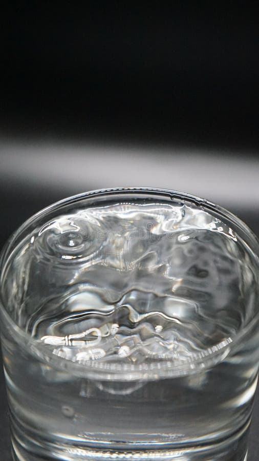 Drop Off Water Splashing on the Glass Picture from the Top Stock Photo ...