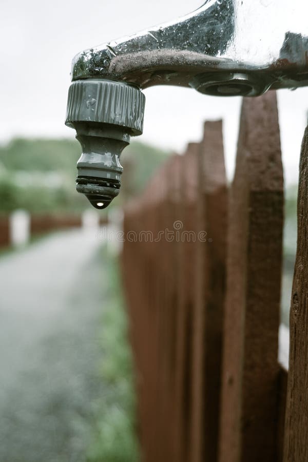 A Drop from an Outdoor Water Tap Stock Photo - Image of water, outdoor ...