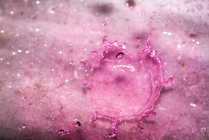 A drop of pink water stock image. Image of galaxy, abstract - 157770715